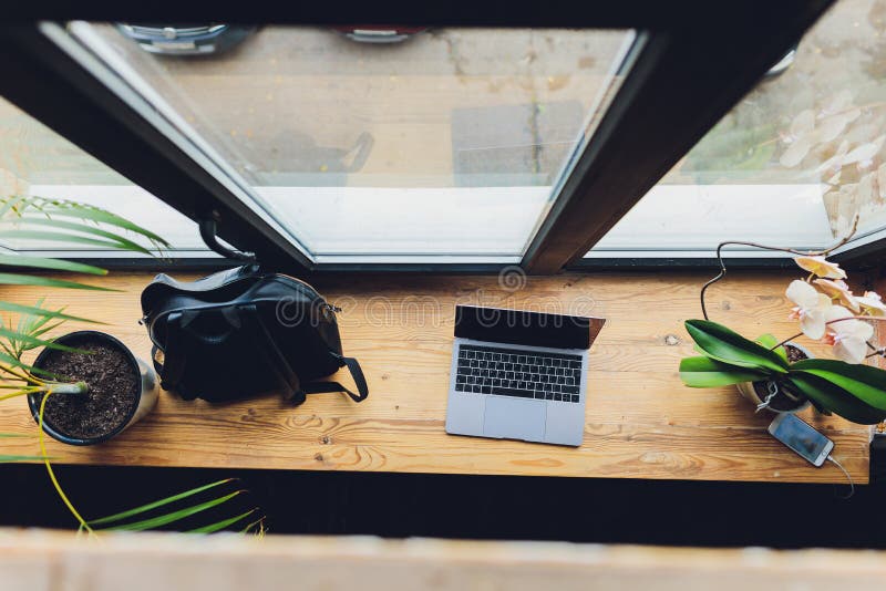 Workplace with Notebook Laptop Comfortable Work Table in Office Windows ...