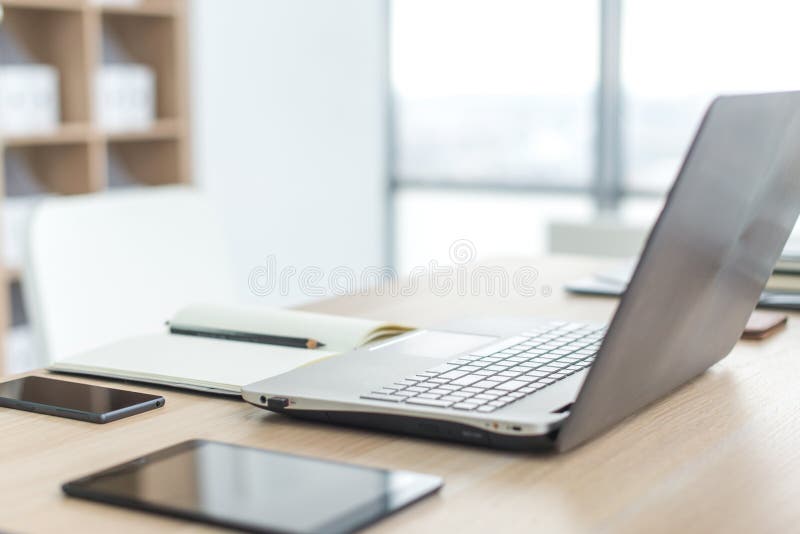 Workplace with Notebook Laptop Comfortable Work Table in Office Windows ...