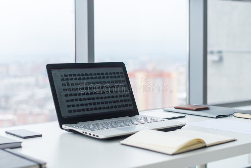 Workplace with Notebook Laptop Comfortable Work Table in Office Windows ...