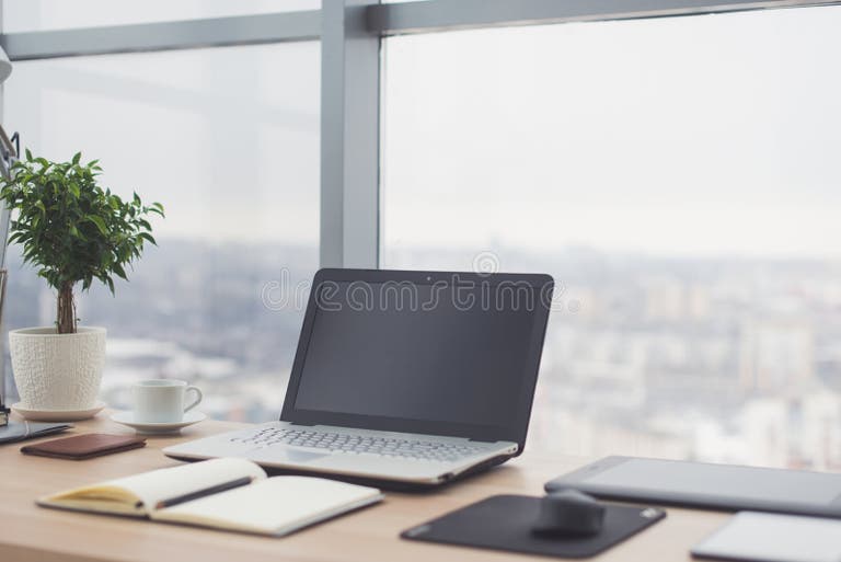 Workplace with Notebook Laptop Comfortable Work Table in Office Windows ...