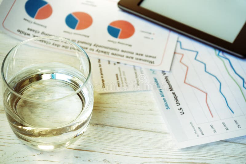 Workplace in Office, Glass of Water and Schedules Stock Photo - Image ...