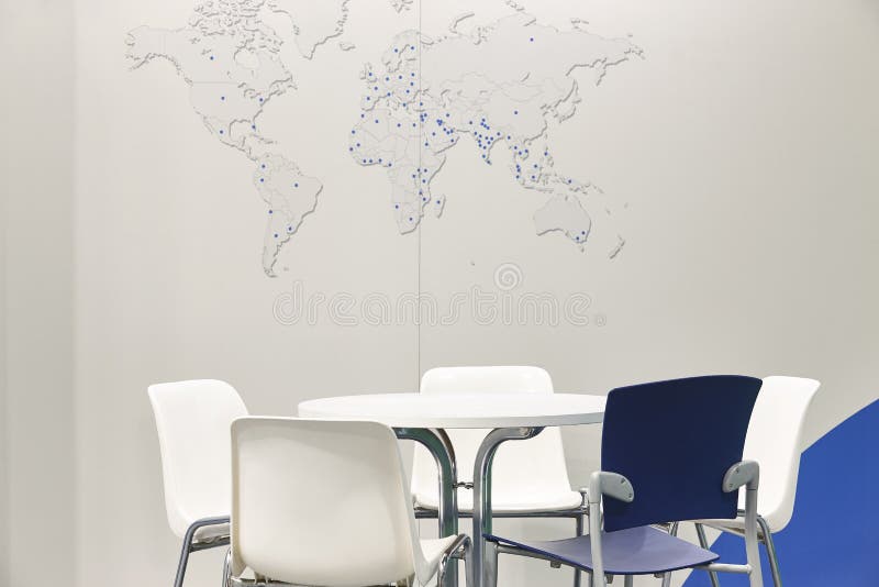 Workplace Room with Table, Chairs and World Map Stock Photo - Image of ...