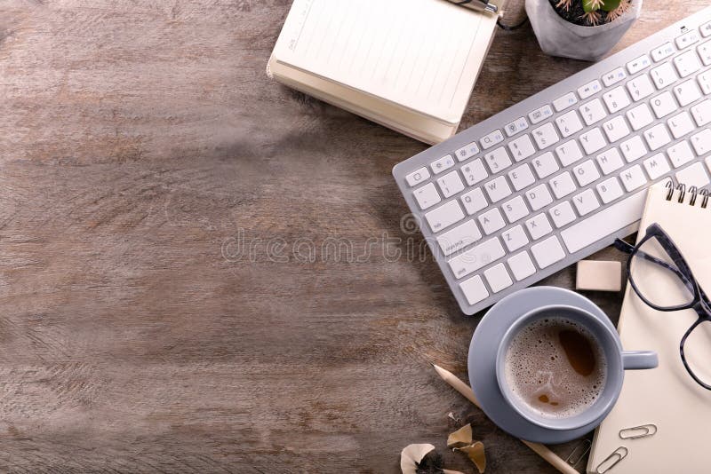 Workplace with Stationery, Keyboard and Cup of Coffee on Table. Top ...