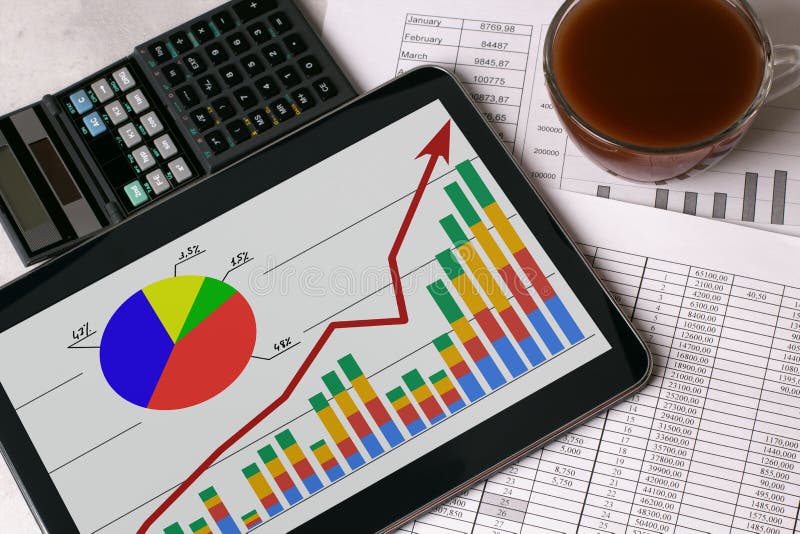 Workplace with Tablet and Stock Charts. Accountant Work Table Stock ...