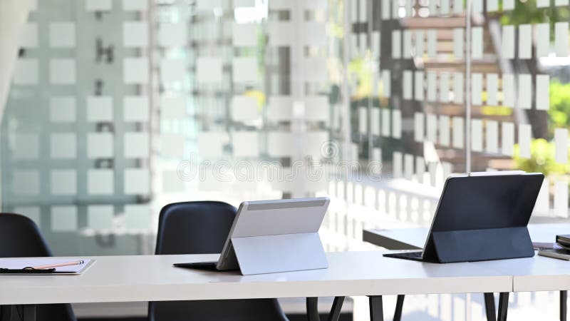 Workplace. Two Computer Tablet with Keyboard Case Putting Together on ...