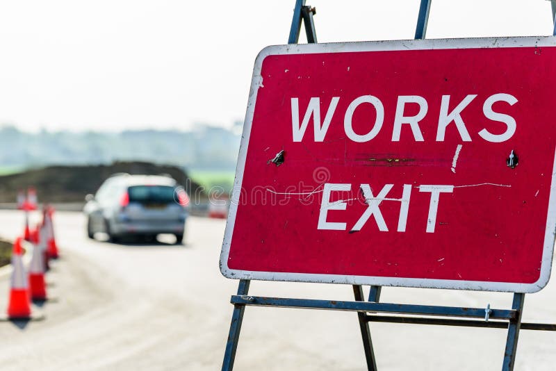 Works Exit Roadworks Sign on UK Motorway Stock Photo - Image of blur ...