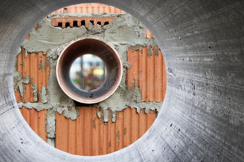 Works on the Laying of Ceramic Bricks. Red Brick Wall with Ventilation ...