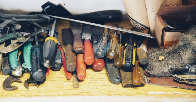 Workshop Bench with an Organized Row of Hand Tools. Stock Photo - Image ...