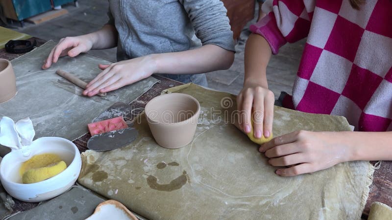 Workshop for Kids. Children Learning How To Use Clay for Making Dishes ...