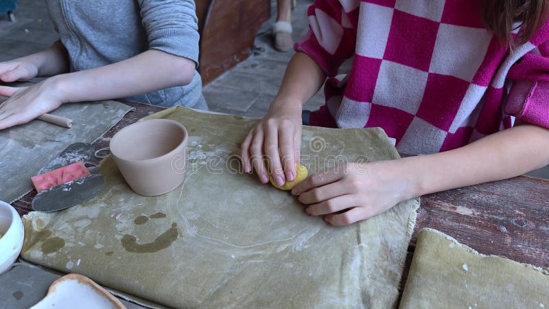 Workshop for Kids. Children Learning How To Use Clay for Making Dishes ...