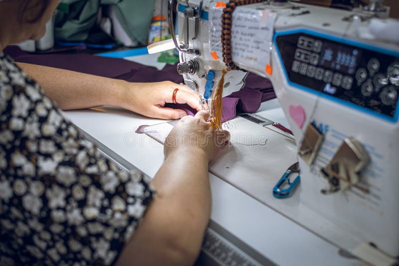 440 Women Stitching Clothes Stock Photos - Free & Royalty-Free Stock ...