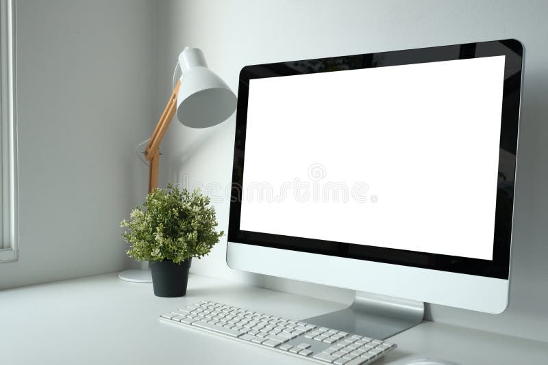 Workspace with Blank White Desktop Computer, Lamp and Plant. Stock ...