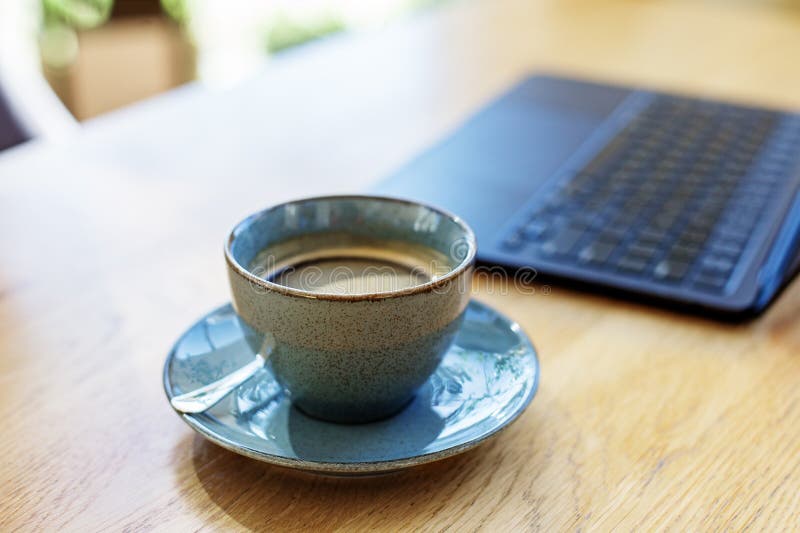Workspace. Ceramic Coffee Cup on Wooden Table with Laptop Stock Image ...