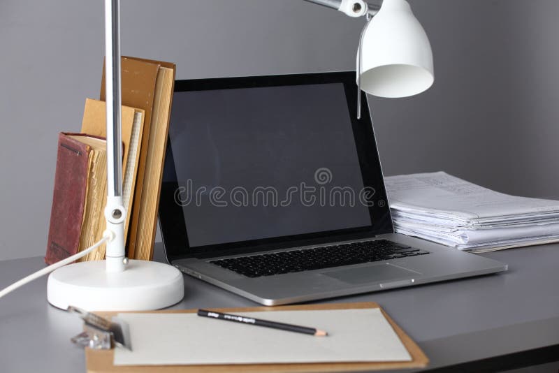 Workspace with Computer and Stack of Papers in Office Stock Image ...
