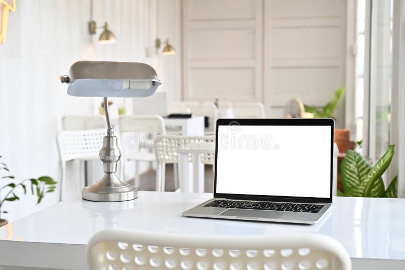 Workspace with Computer Laptop and Lamp on Office Table with Montage ...