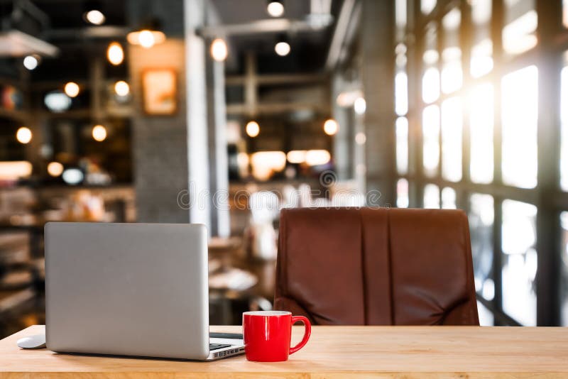 Workspace with Computer, Laptop, Office Supplies, and Coffee Cup at ...