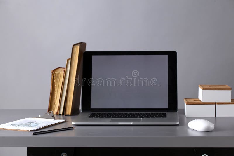 Workspace with Computer and Stack of Papers in Office Stock Photo ...