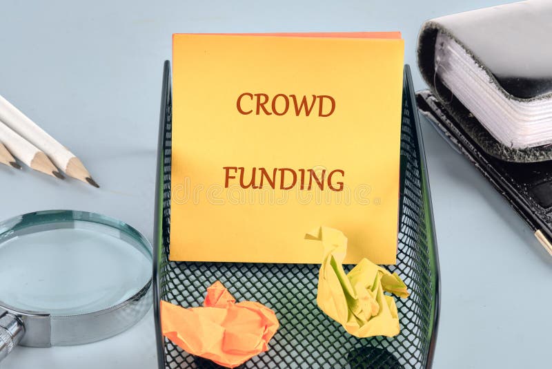 Crowd Funding Concepts and Tools Organized in a Workspace with Writing ...