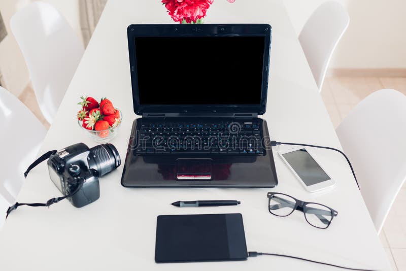 Workspace of Freelancer Photographer in Kitchen. Working from Home ...