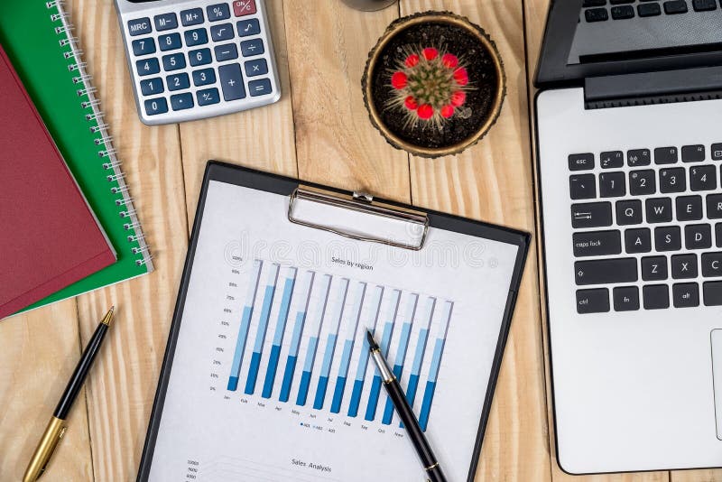 Workspace with Graph, Computer and Others Tools Stock Photo - Image of ...