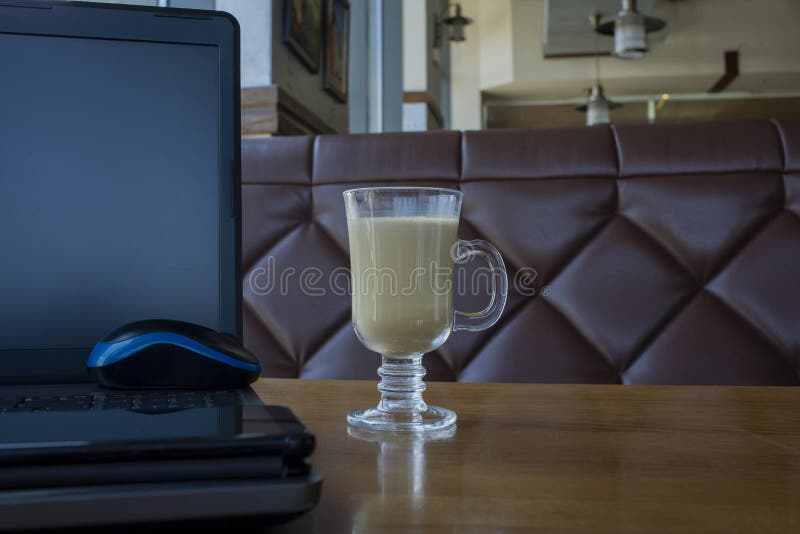 Workspace with Laptop, a Cup of Coffee and a Mouse for a Laptop, Phone ...