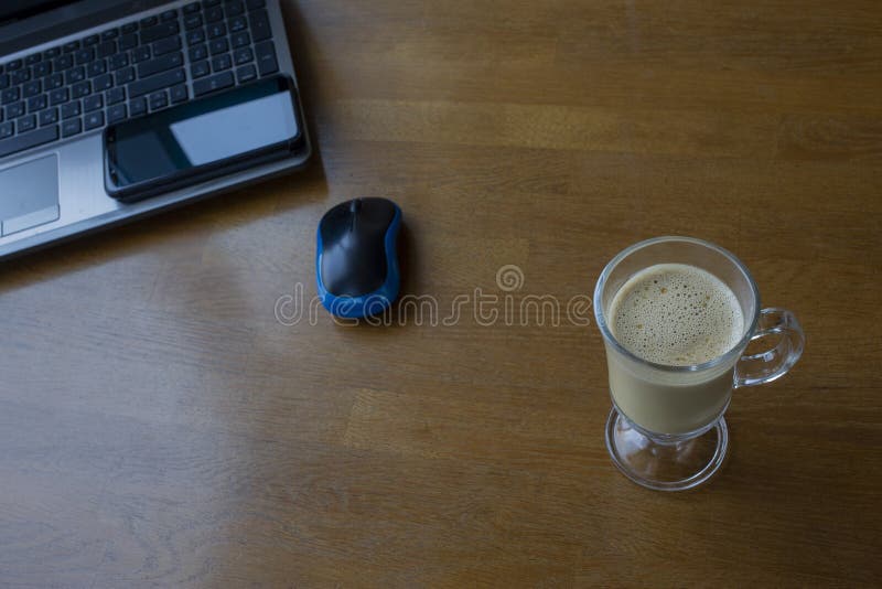 Workspace with Laptop, a Cup of Coffee and a Mouse for a Laptop, Phone ...