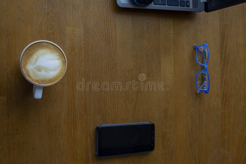 Workspace with Laptop, a Cup of Coffee and a Mouse for a Laptop, Phone ...