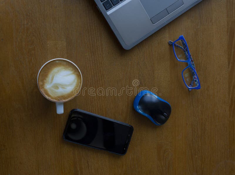 Workspace with Laptop, a Cup of Coffee and a Mouse for a Laptop, Phone ...