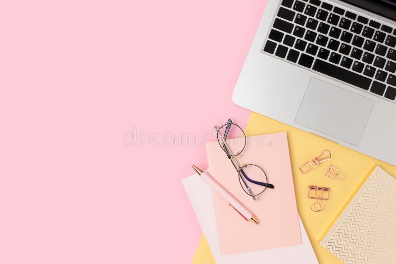 Workspace with Laptop and Office Supply on a Pink Background. Stock ...