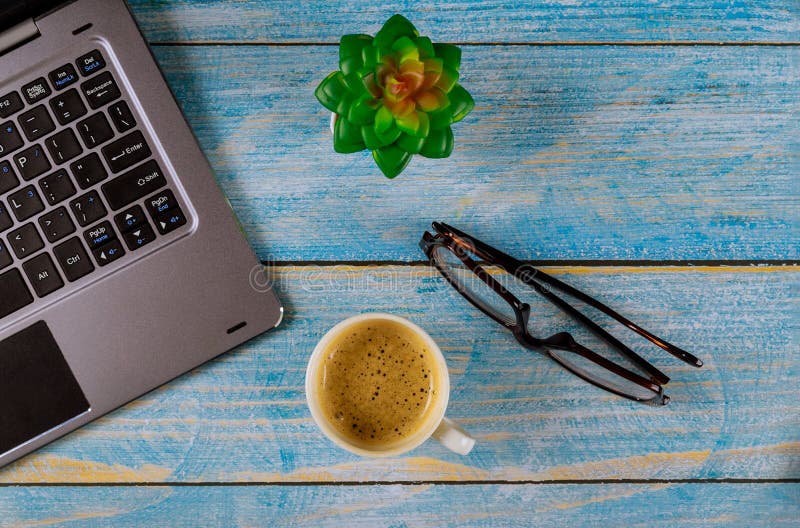 Office Table with Computer and Coffee Cup, Glasses View from Above ...