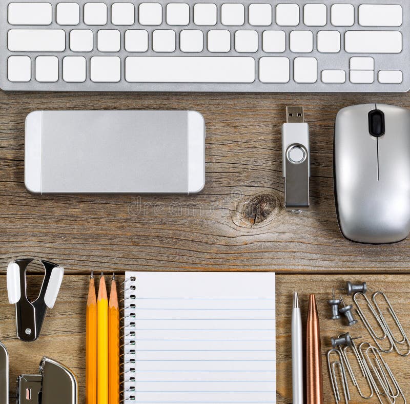 Workspace with Simple Office Supplies on Aged Desktop Stock Photo ...