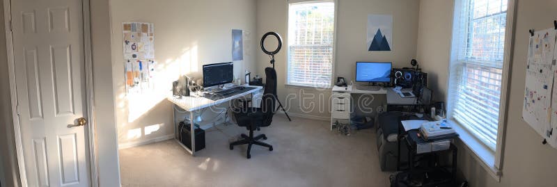 Workspace with Two Desks, Computer Setups, and Natural Light in a Home ...