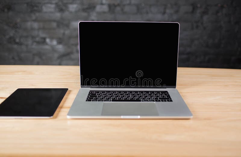 Desktop with Touch Pad and Portable Net-book. Modern Workspace with ...