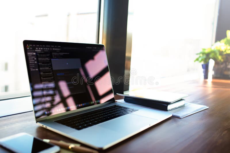 Modern Netbook Gadget on Wooden Table in Coworking Space Stock Photo ...