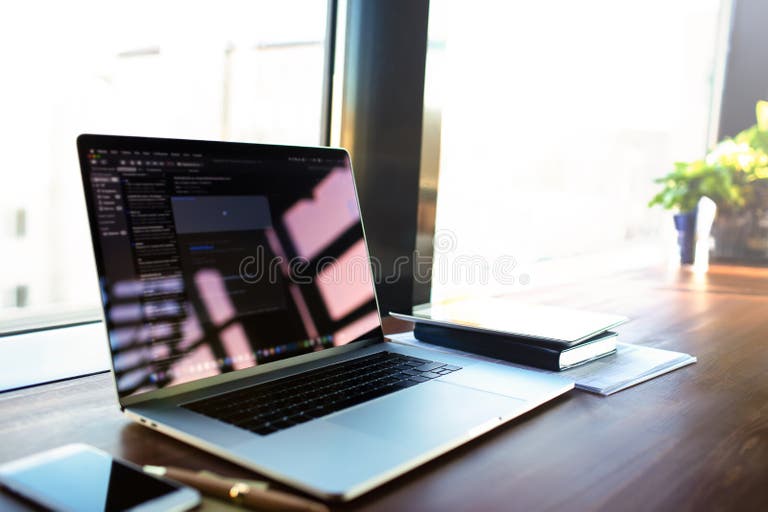 Modern Netbook Gadget on Wooden Table in Coworking Space Stock Photo ...