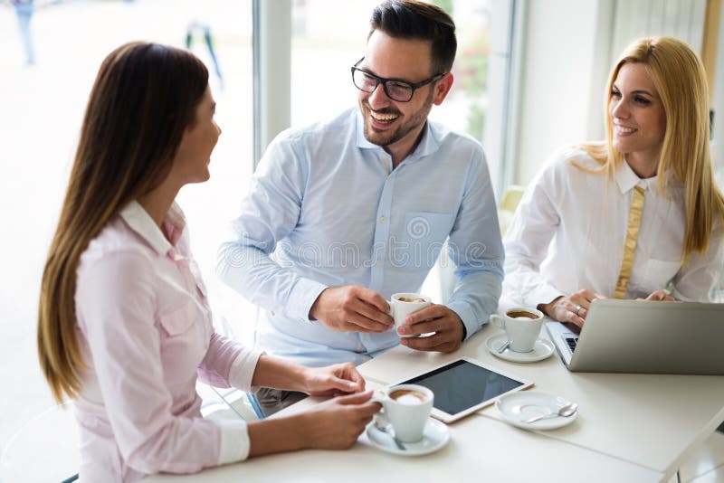 Workteam in Office Working Together on Laptop Stock Image - Image of ...