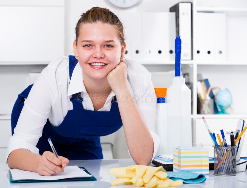 Workwoman of Office Cleaning Service Wiping Dust on Sleek Table Stock ...