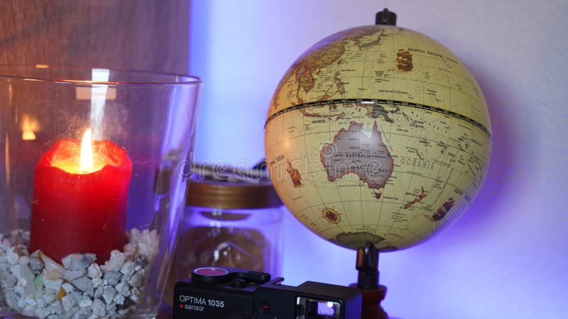 World Earth Globe in a Decorated Room with LED Back Lighting and Candle ...
