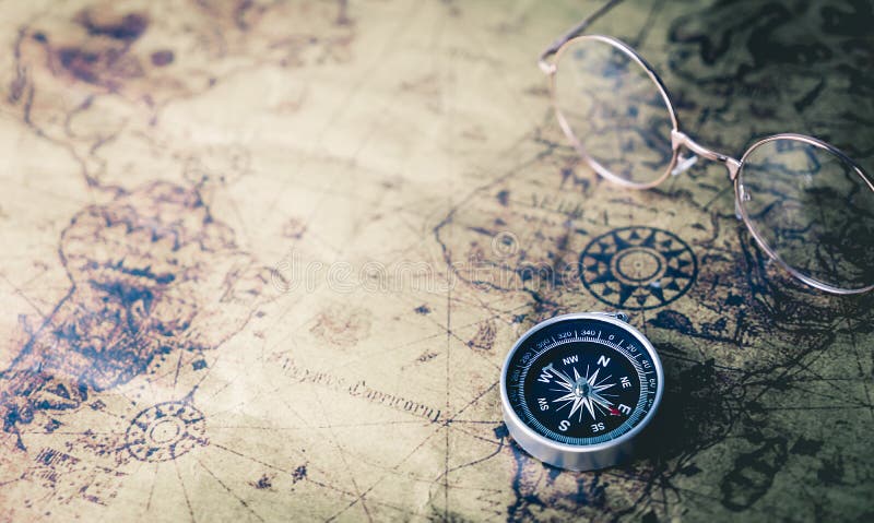World Explorer Equipment with Compass on Vintage Map Stock Image ...