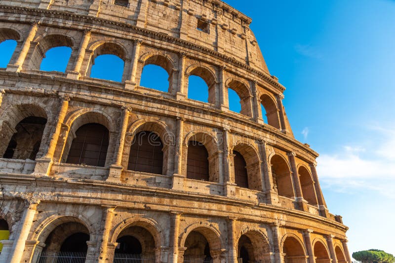 World Famous Coliseum Under a Blue Sky Stock Image - Image of dramatic ...