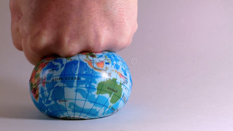 World Globe is Crushed by a Man`s Fist, Ecological Problems Stock Image ...