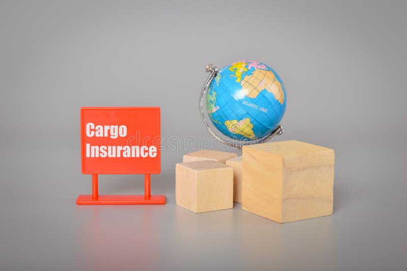 World Globe, Wooden Blocks and Plastic Board with Text CARGO INSURANCE ...