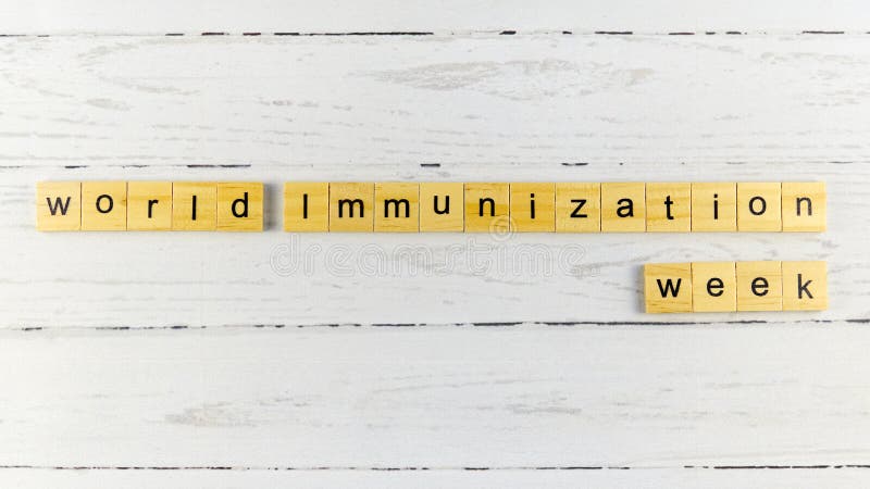 World Immunization Week.words from Wooden Cubes with Letters Stock ...