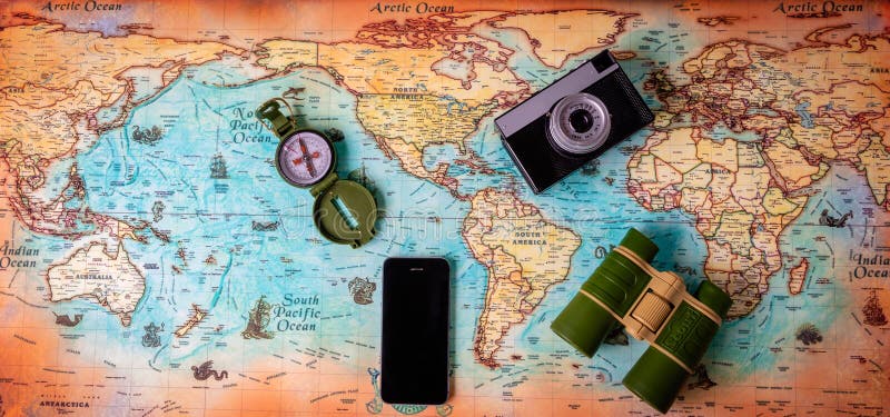 World Map with Phone, Photo Camera, Compass and Binocular Stock Image ...