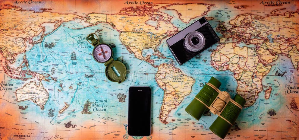 World Map with Phone, Photo Camera, Compass and Binocular Stock Image ...