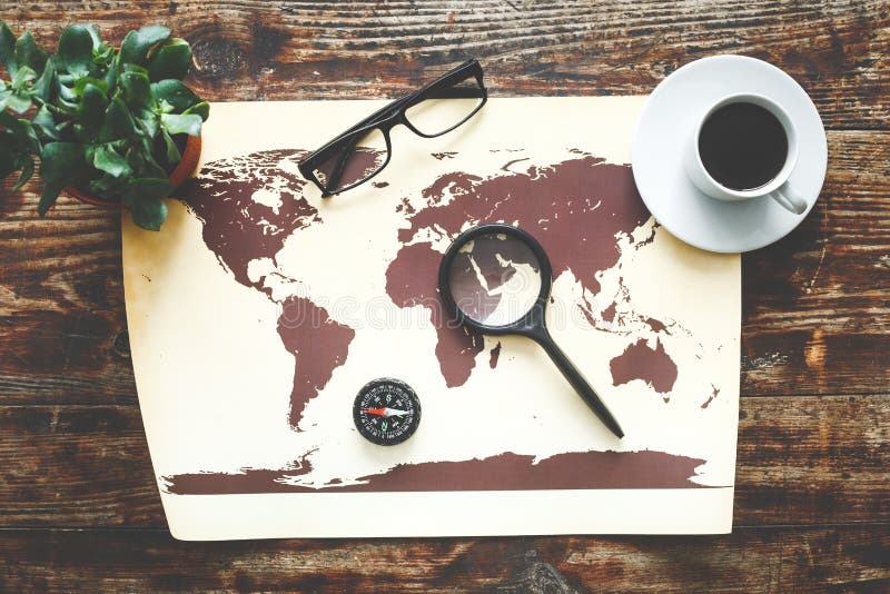 World Map on a Wooden Table Top View Stock Photo - Image of traveler ...