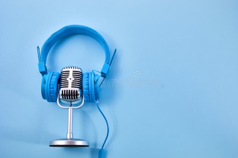 World Music Day Concept. Stereo Headphone and a Microphone on a Blue ...