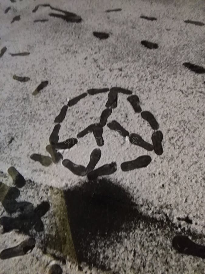 World peace on a snowy day stock photo. Image of iron - 188701424