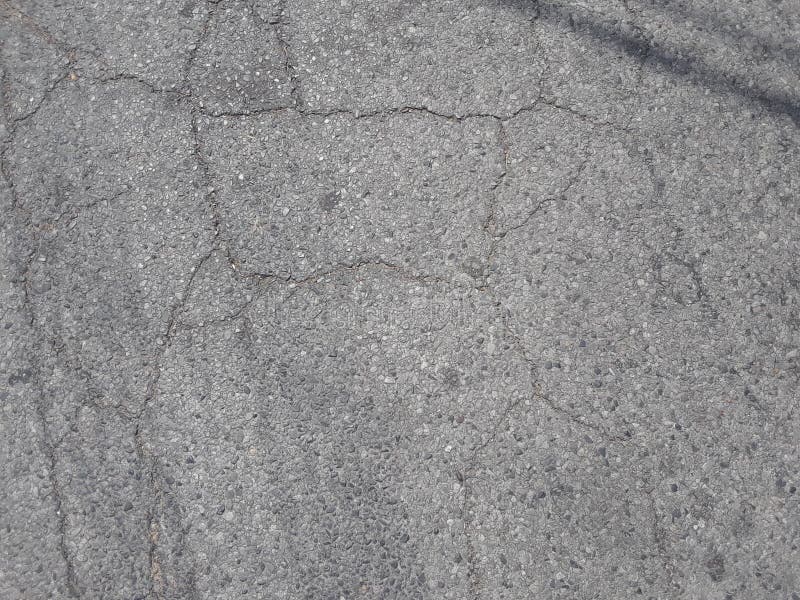 Worn Asphalt Road Heading Into The Mountains Stock Photo - Image of ...