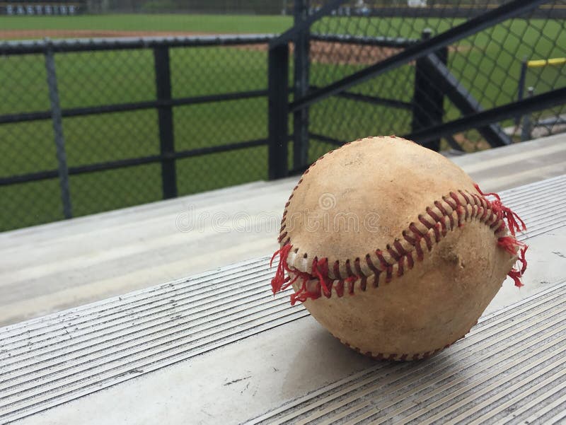 Worn Baseball in Corner of Bleachers Stock Image - Image of spring ...